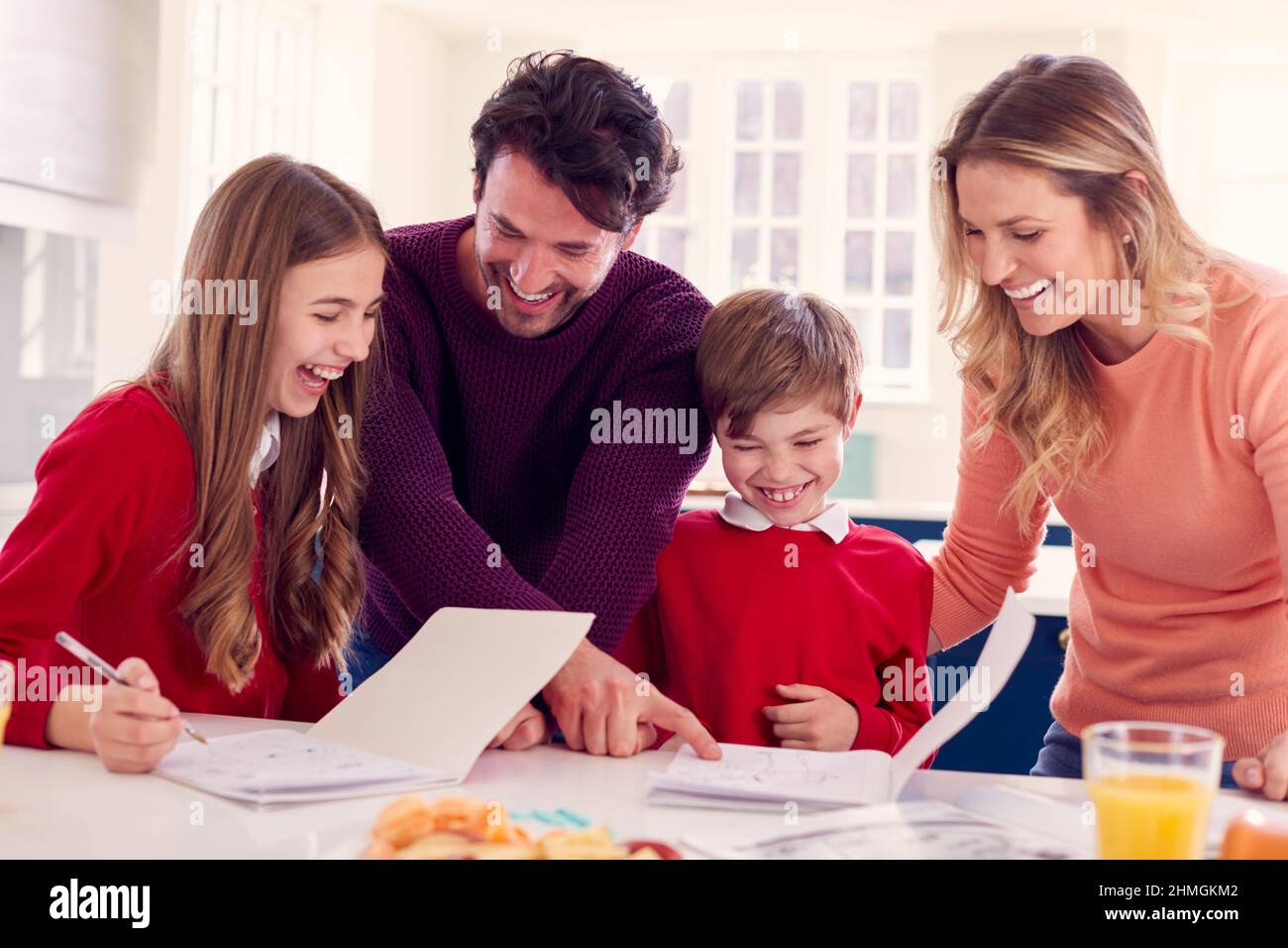 Child school uniform talking parent hi-res stock photography and images ...