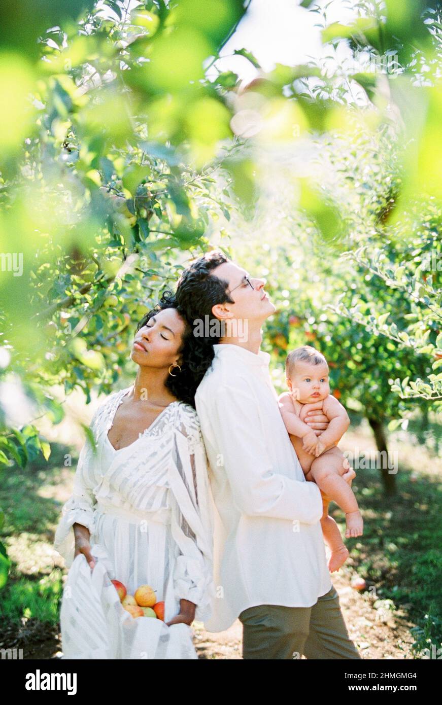 Newborn baby leaning on mother hi-res stock photography and images - Alamy