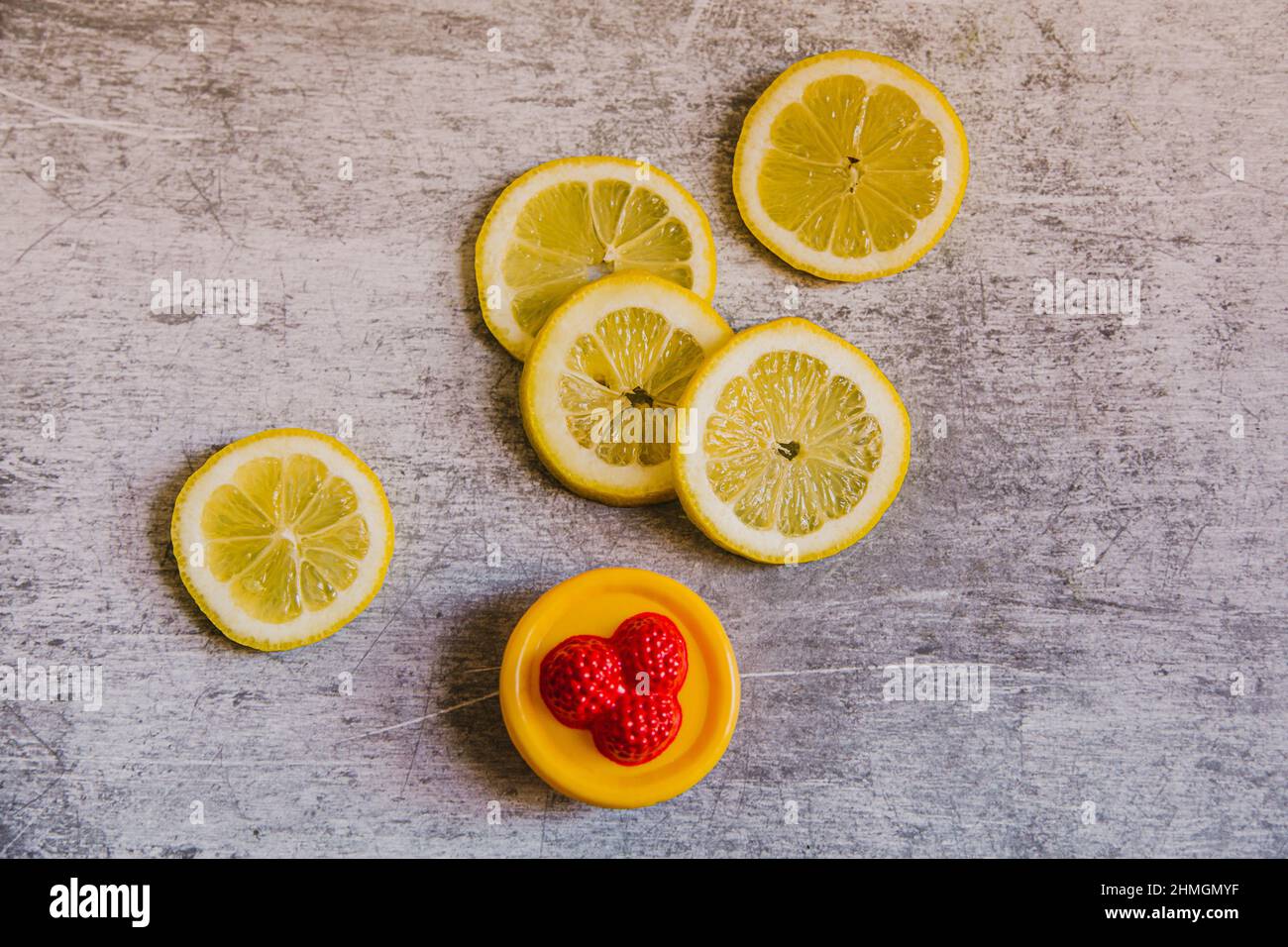 Lemons and plastic toy . Seamless pattern of lemons on an industrial ...