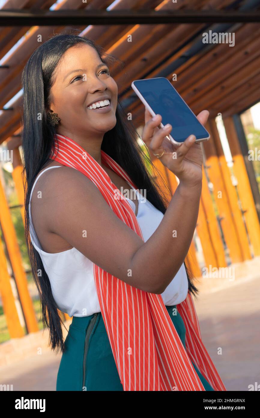 Happy Young Woman Taking A Selfie Ad Showing The Phone Screen Stock