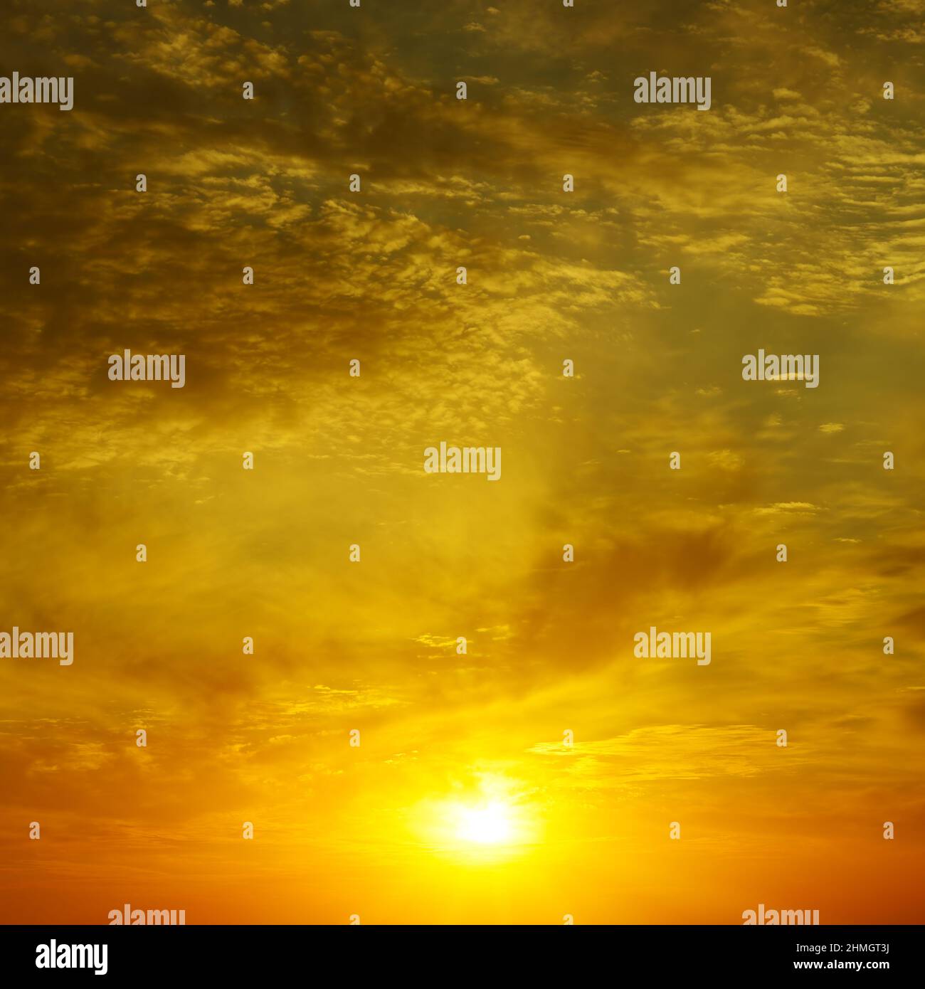 Cloudy sky with golden sunset hi-res stock photography and images - Alamy