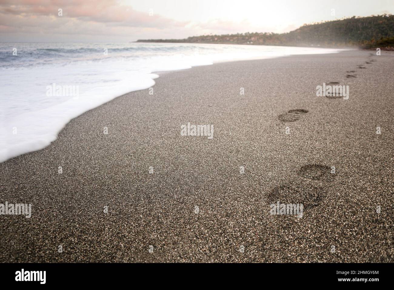 footsteps on a beach Stock Photo - Alamy