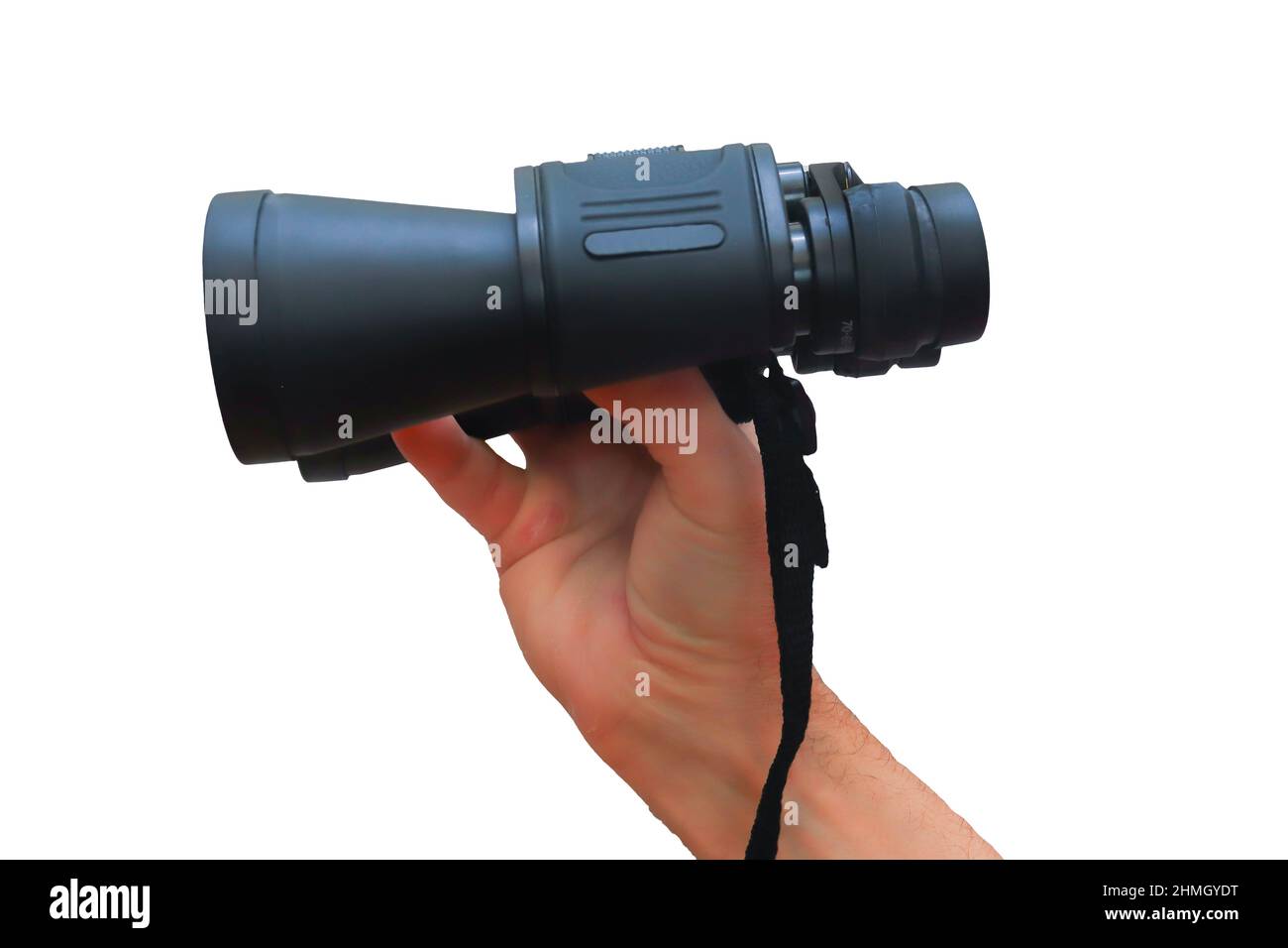 Black binoculars in the man's hand are close-up. Optical device for ...