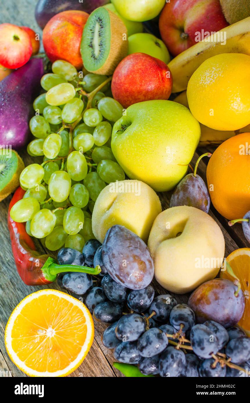 Wide variety of Fruits and vegetables closeup Stock Photo - Alamy