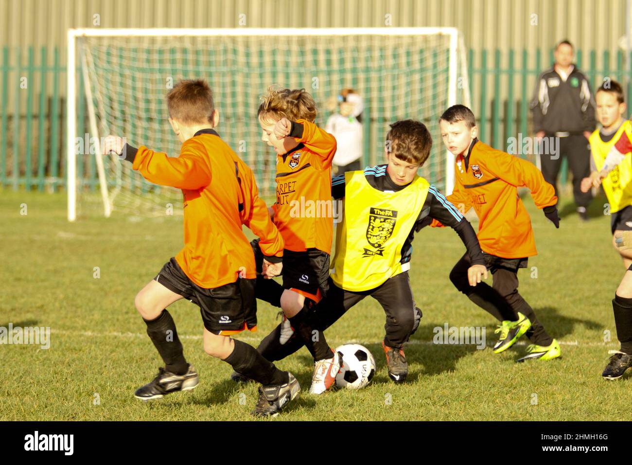 Children playing football and pitch hi-res stock photography and images ...