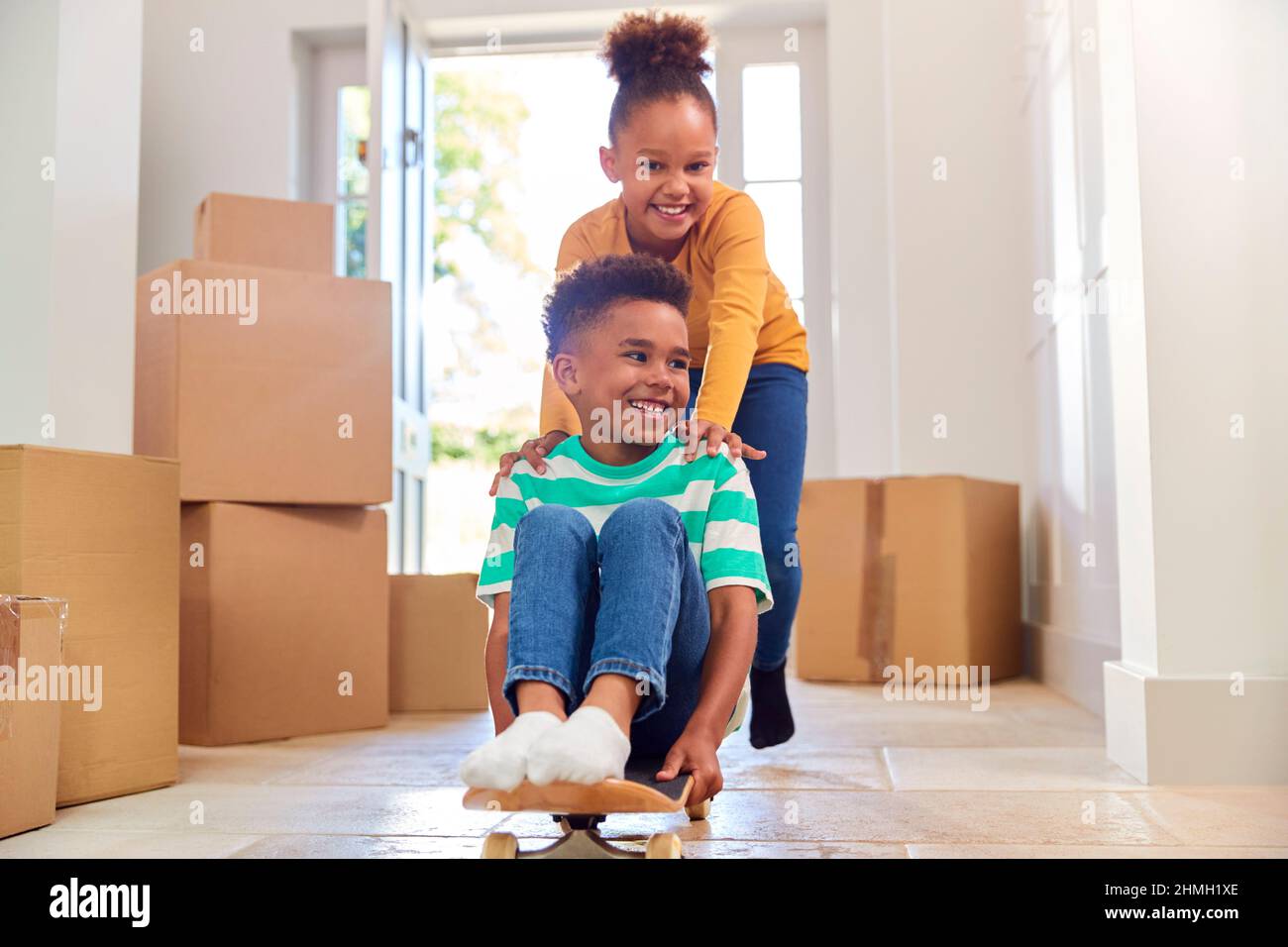 Children playing with boxes hi-res stock photography and images - Alamy
