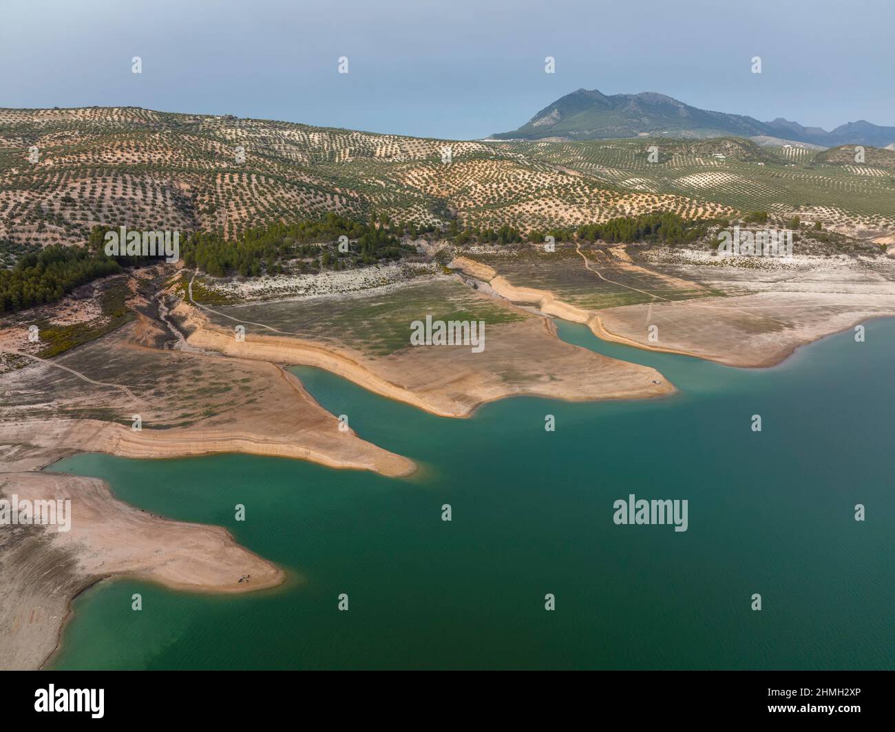 view of a water reservoir with low water levels Stock Photo - Alamy