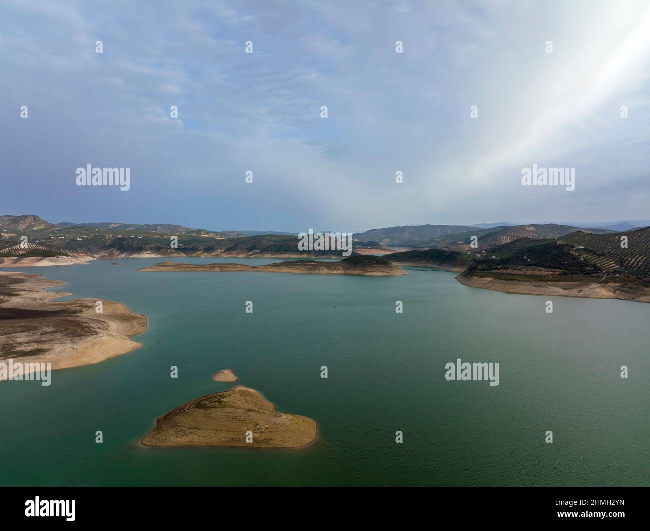 view of a water reservoir with low water levels Stock Photo - Alamy