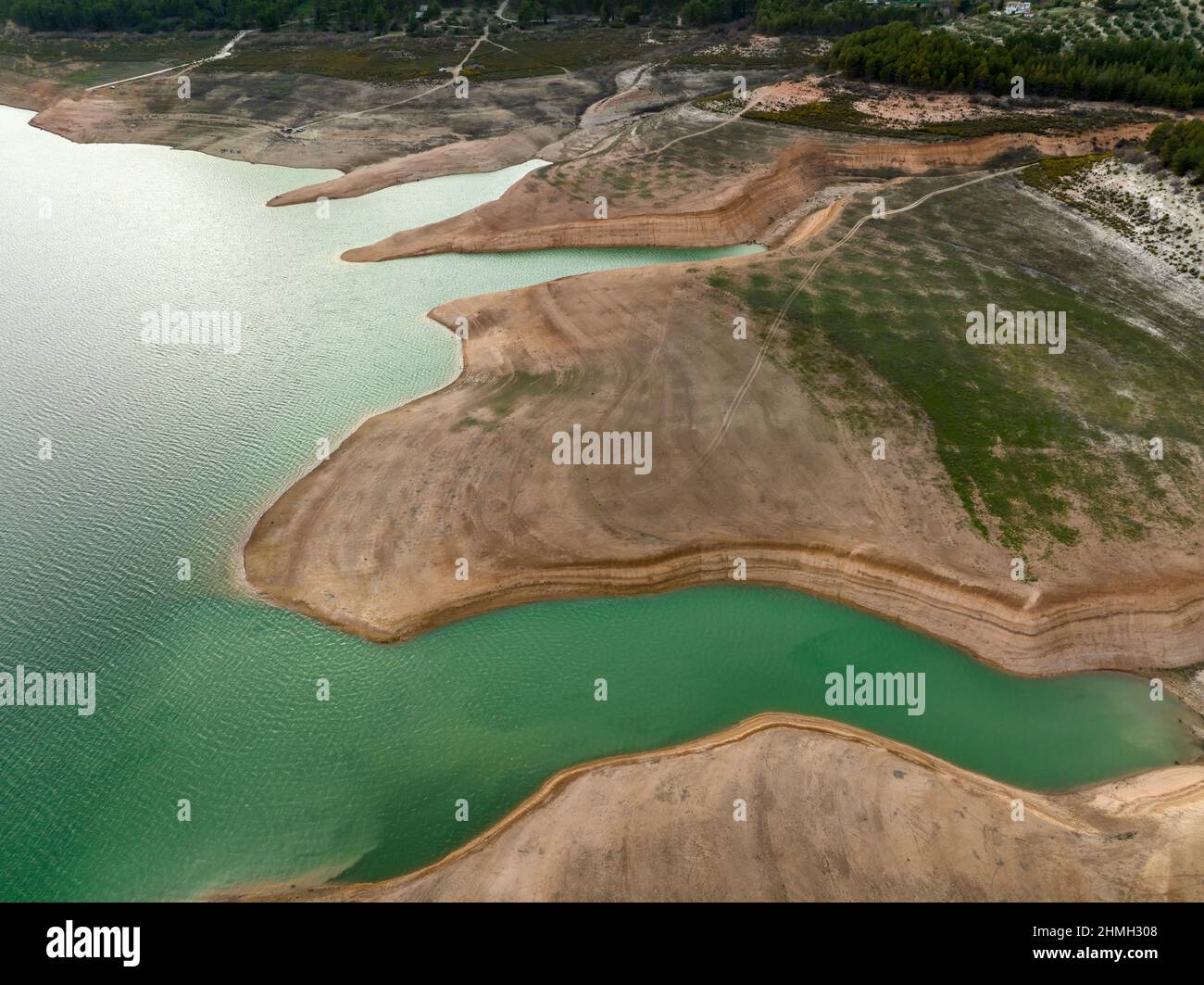 view of a water reservoir with low water levels Stock Photo - Alamy