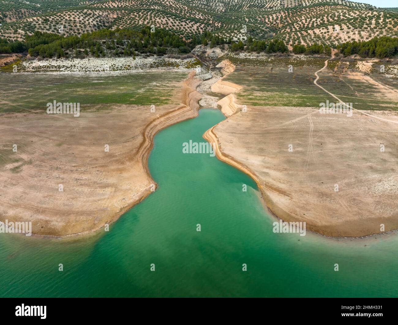 view of a water reservoir with low water levels Stock Photo - Alamy