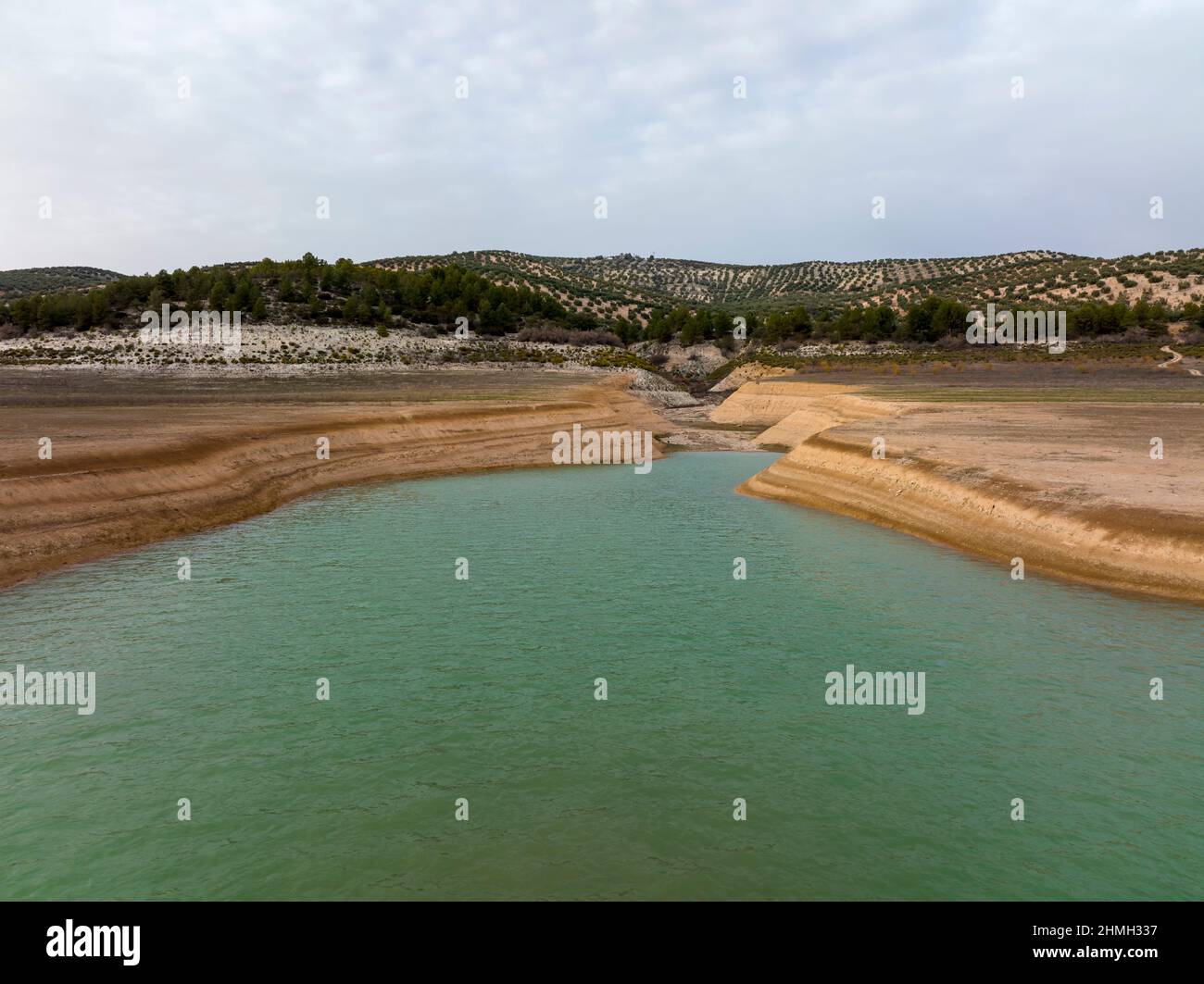 view of a water reservoir with low water levels Stock Photo - Alamy