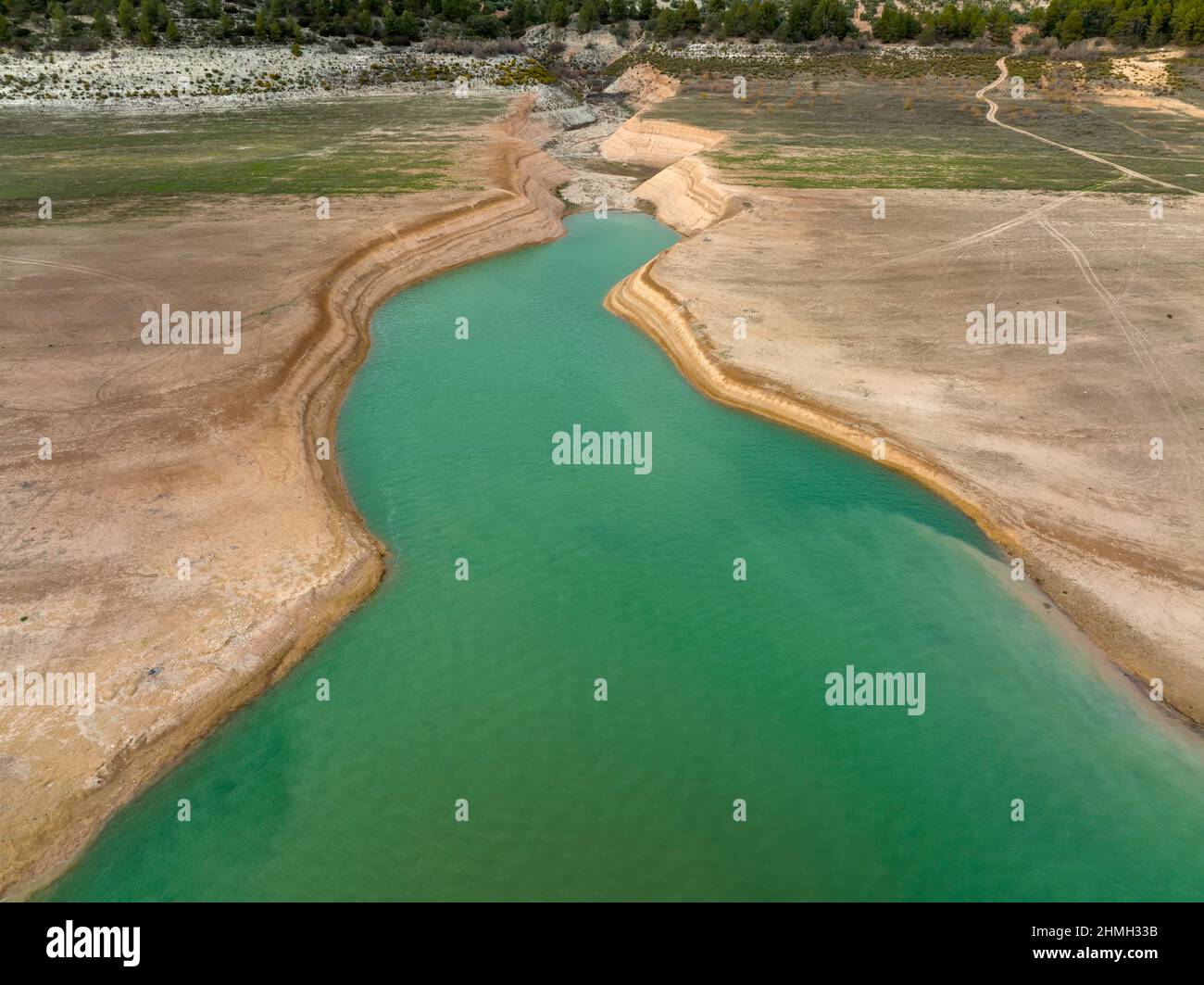 view of a water reservoir with low water levels Stock Photo - Alamy