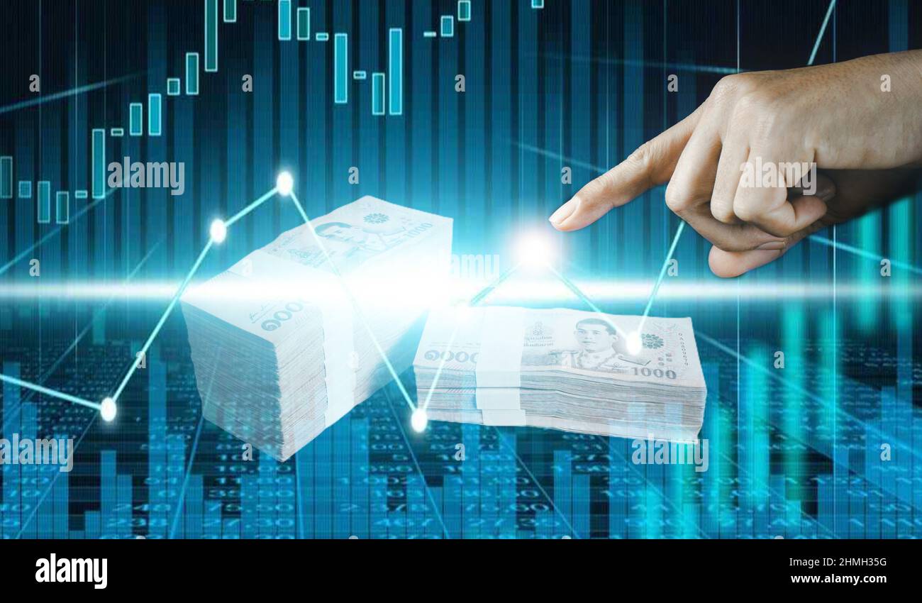 Investment concept,hand with stock financial chart symbols coming from ...