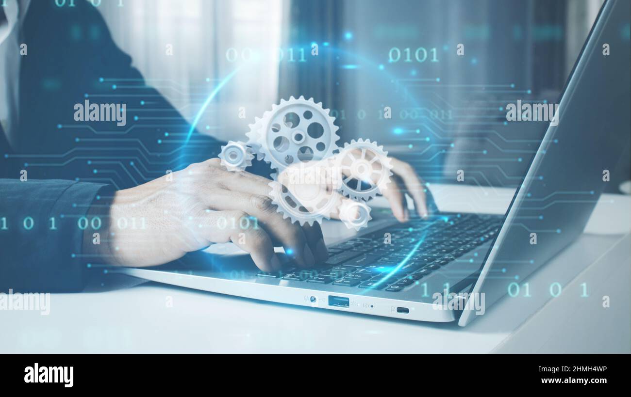 Male businessmen use notebook computers to analyze data for business ...