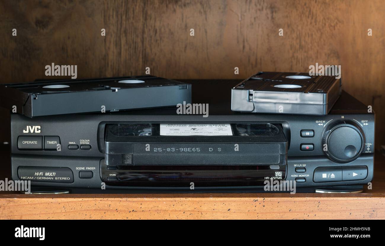 VHS Player with a selection of VHS tapes as a fair representation of an ...
