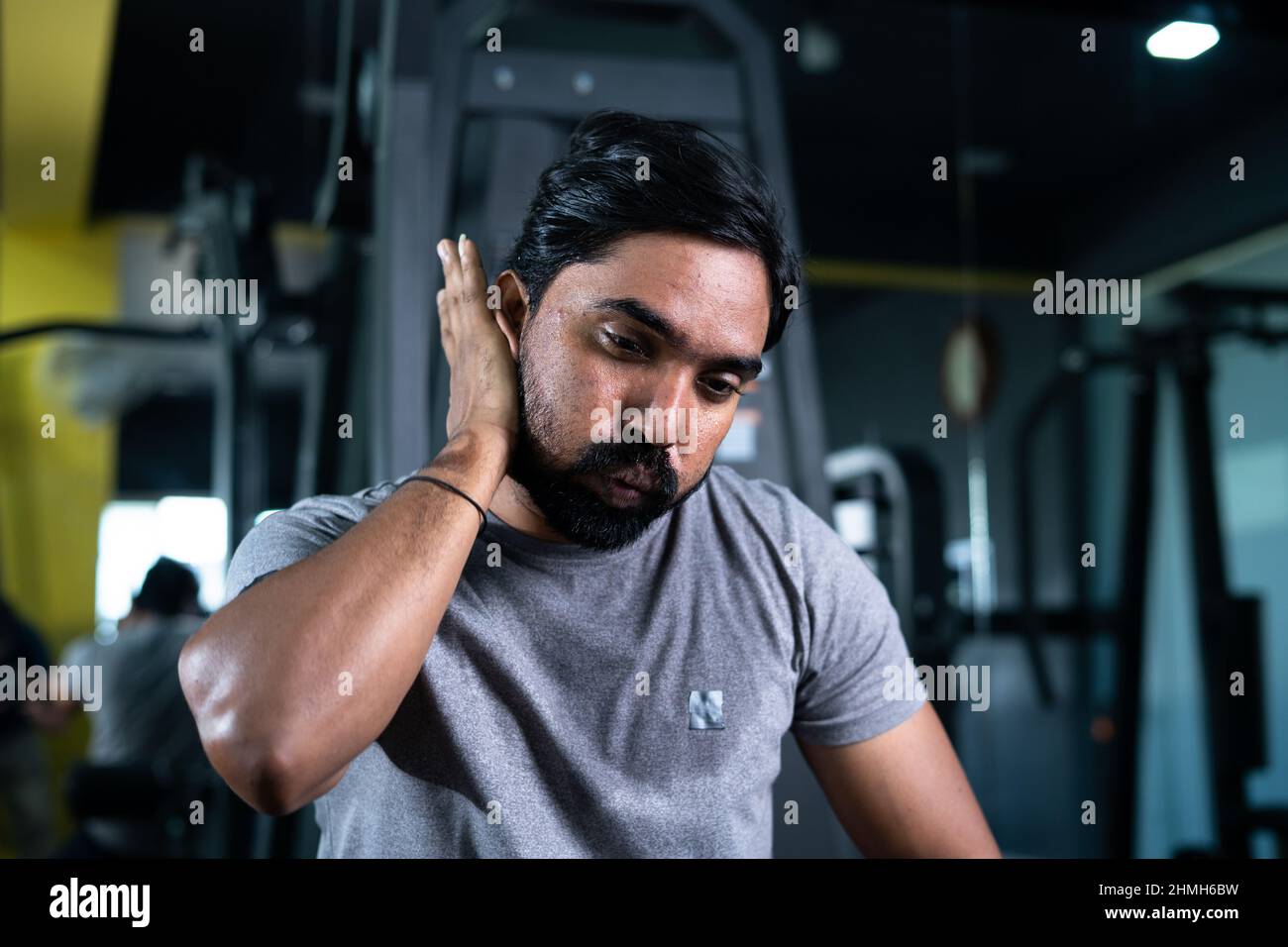 close up shot of young man with washing sweat after heavy workout at ...
