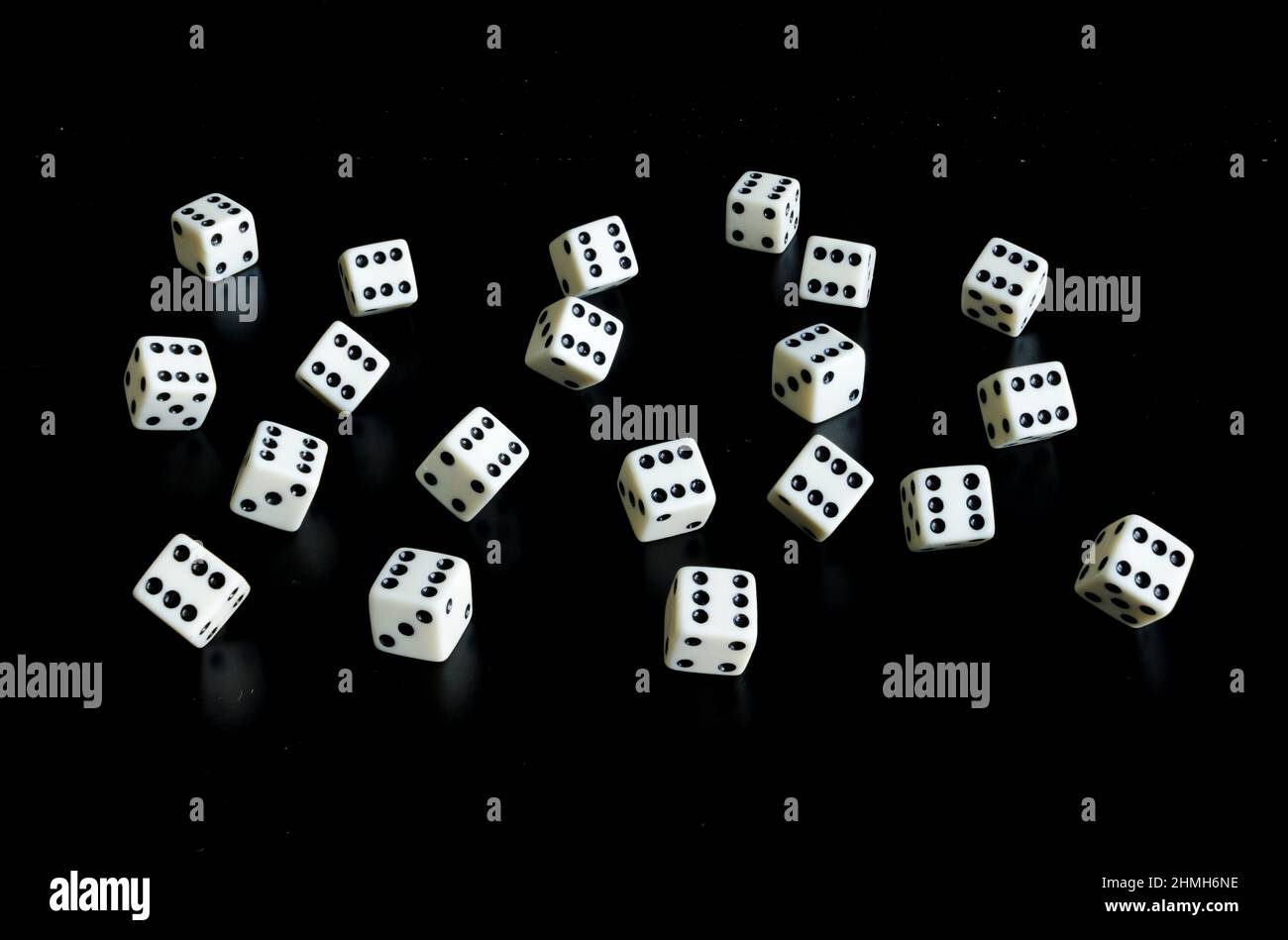 Thrown the dice on black background with reflection Stock Photo - Alamy