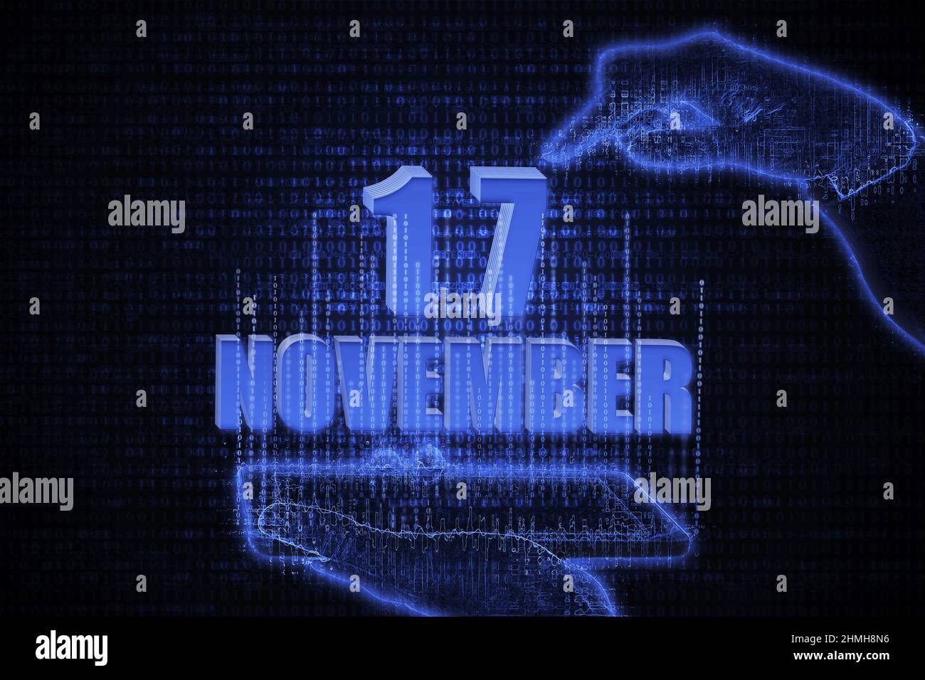 November 17th. A hand holding a phone with a calendar date on a ...