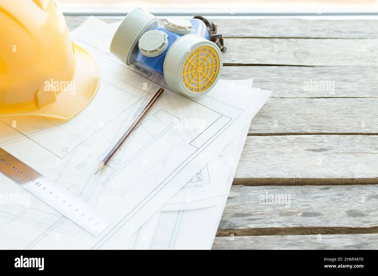 Engineering workplace, drawings, protective construction helmet and ...