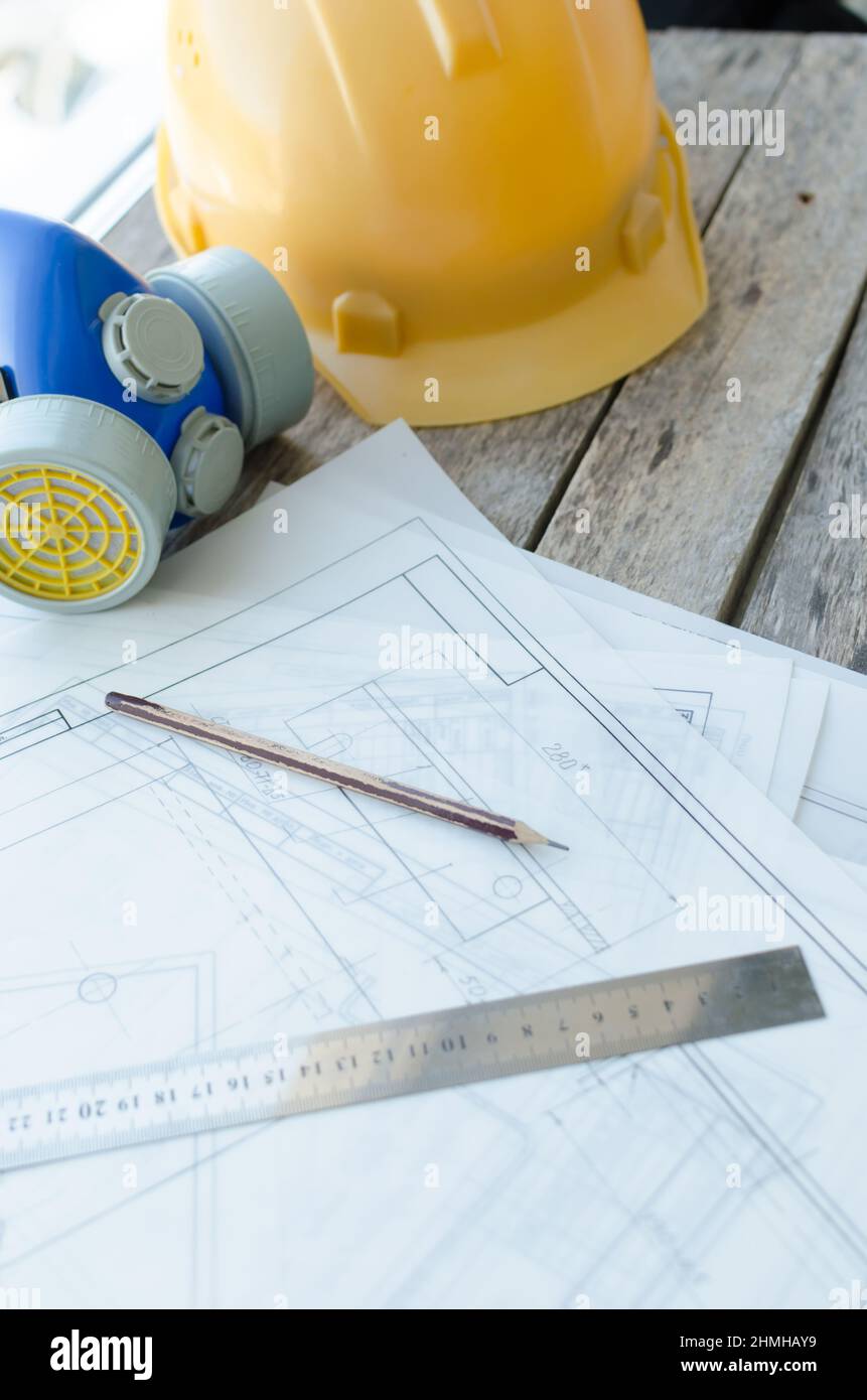 Engineering workplace, drawings, protective construction helmet and ...
