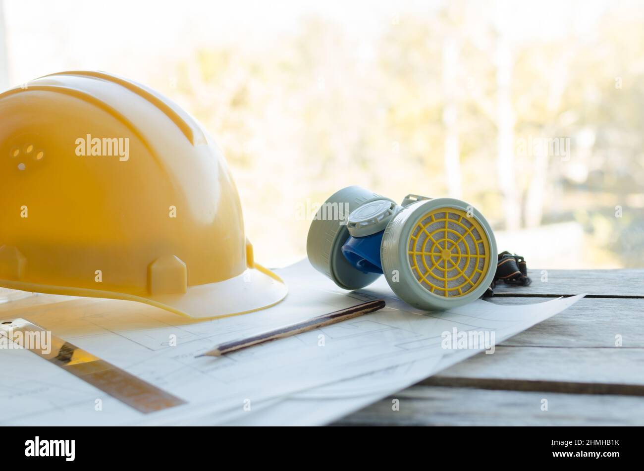 Engineering workplace, drawings, protective construction helmet and ...