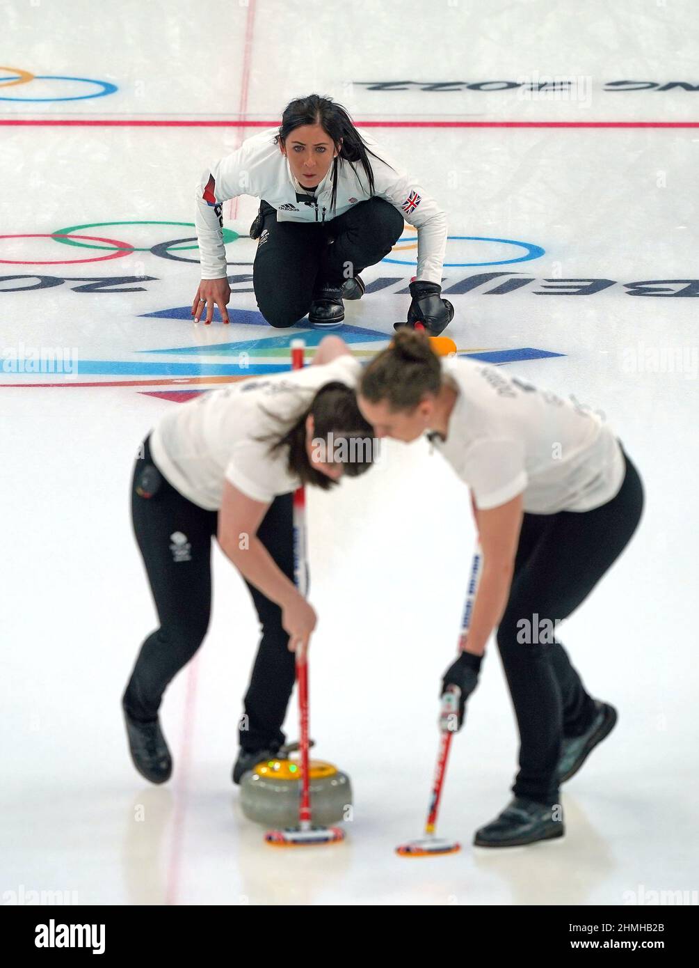 Great Britain's Eve Muirhead (centre) looks on as Hailey Duff (left ...