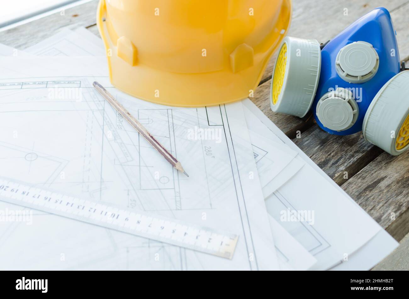 Engineering workplace, drawings, protective construction helmet and ...