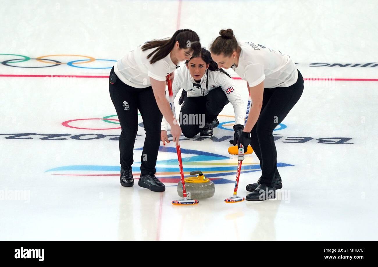Great Britain's Eve Muirhead (centre) looks on as Hailey Duff (left ...