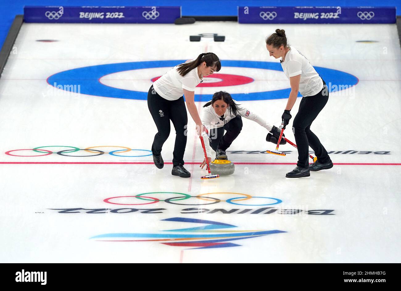 Great Britain's Eve Muirhead (centre) looks on as Hailey Duff (left ...