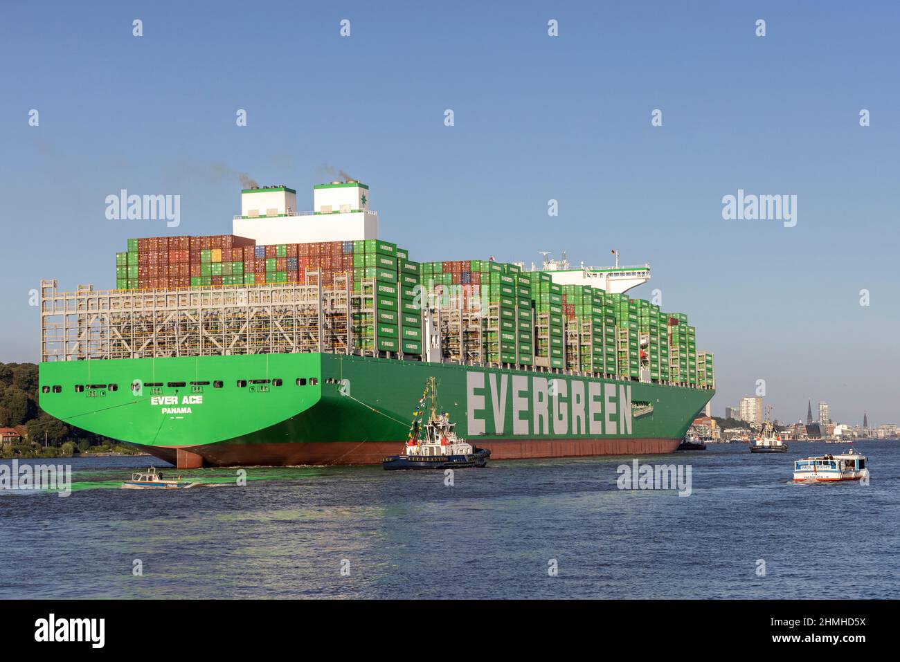 The Ever Ace is pulled by tugs near Hamburg Blankenese Stock Photo - Alamy