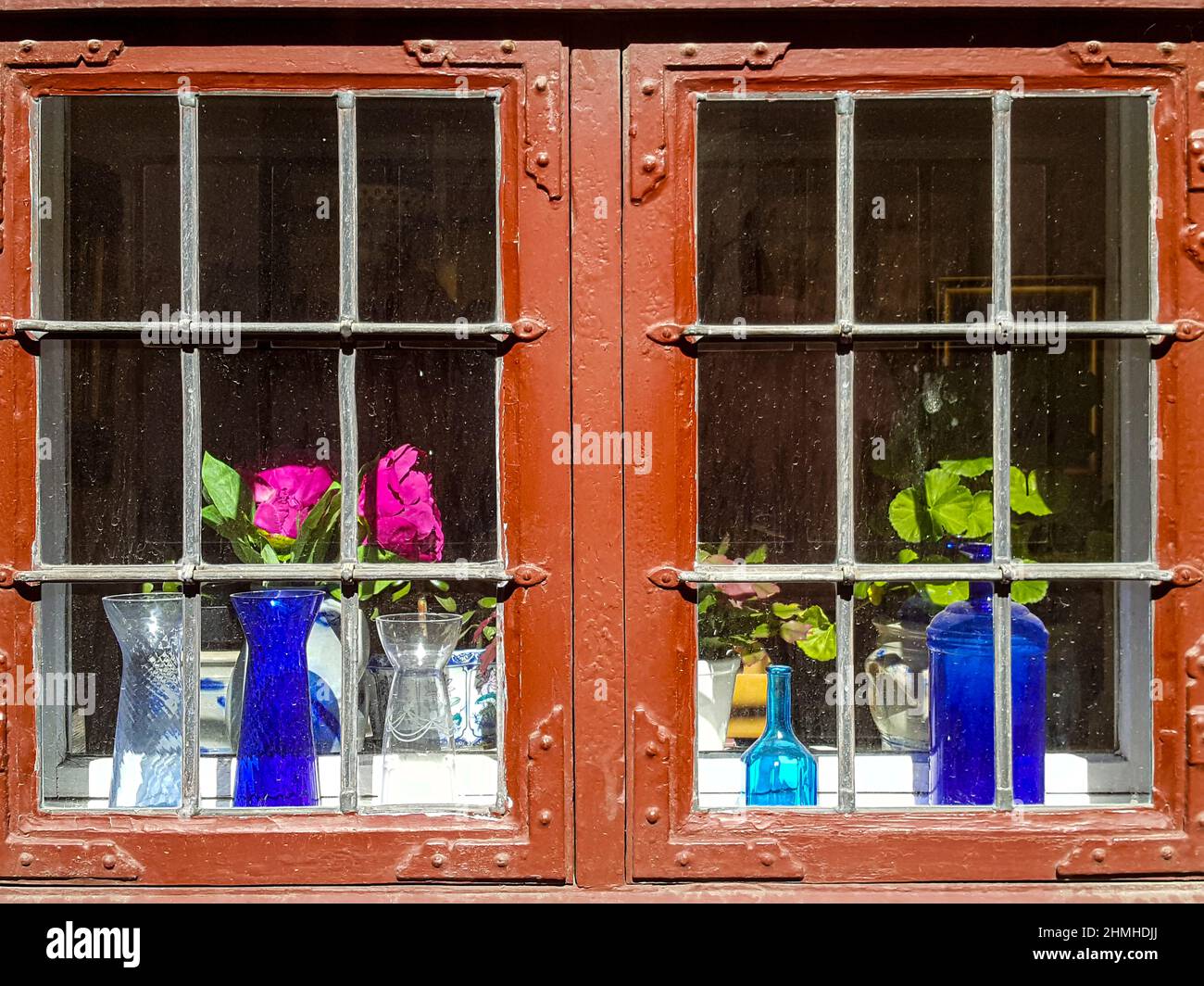 House window with colorful flower vases in Helsingør, Denmark Stock ...