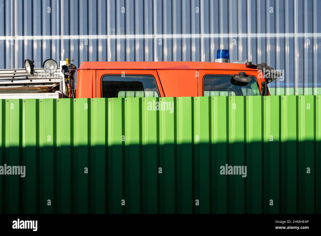 Fire truck, green fence, Port of Duisburg Stock Photo - Alamy