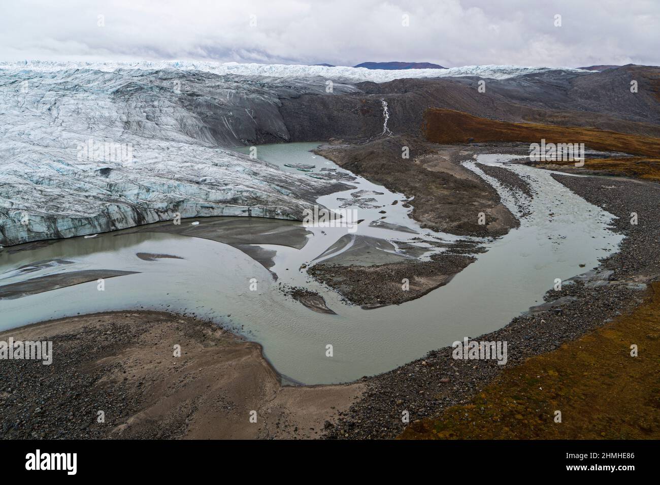 Drone image of the glacier front, meltwater lake, meltwater flow and ...
