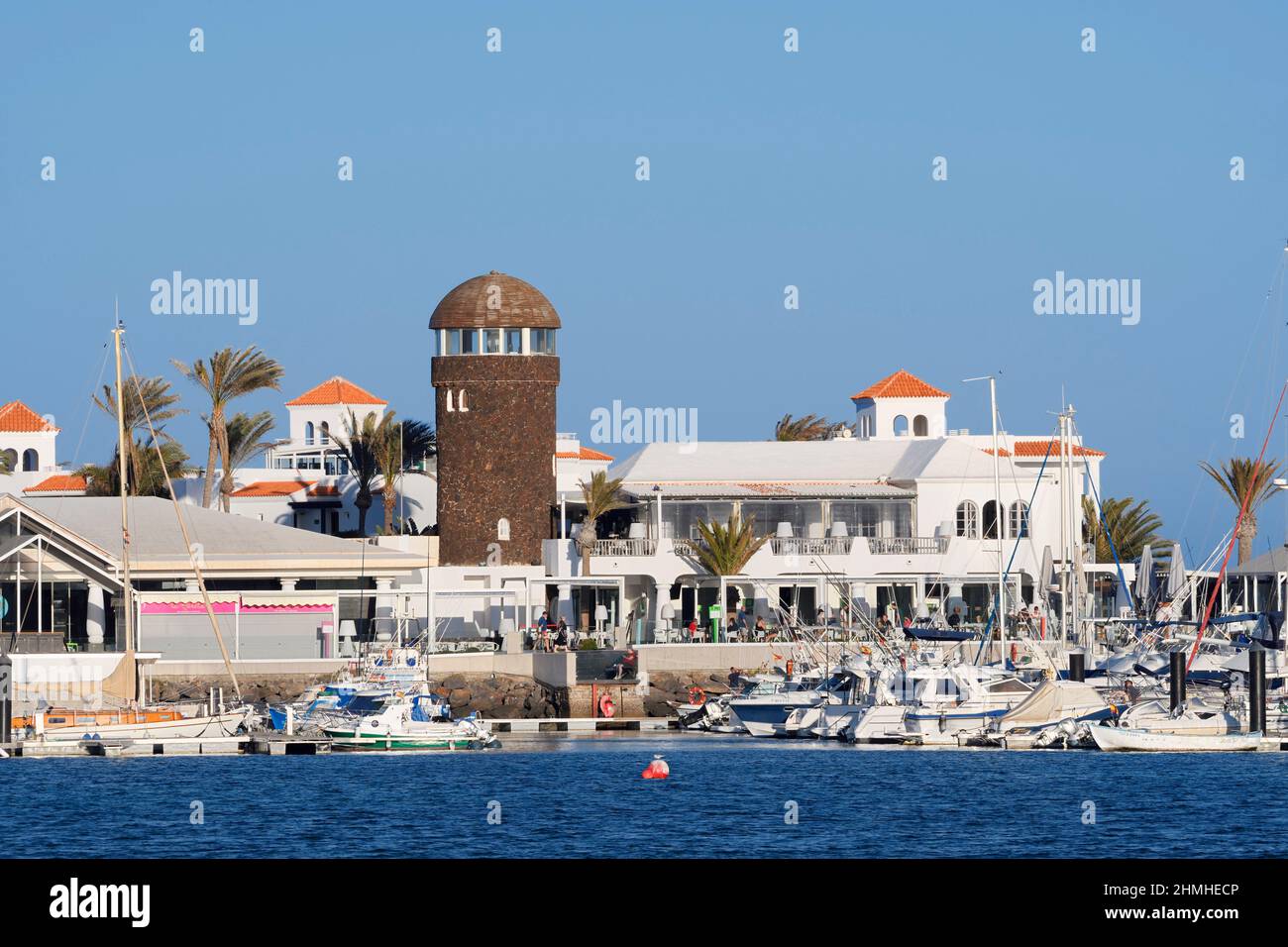 Marina with lighthouse, Caleta de Fuste, Fuerteventura, Canary Islands ...