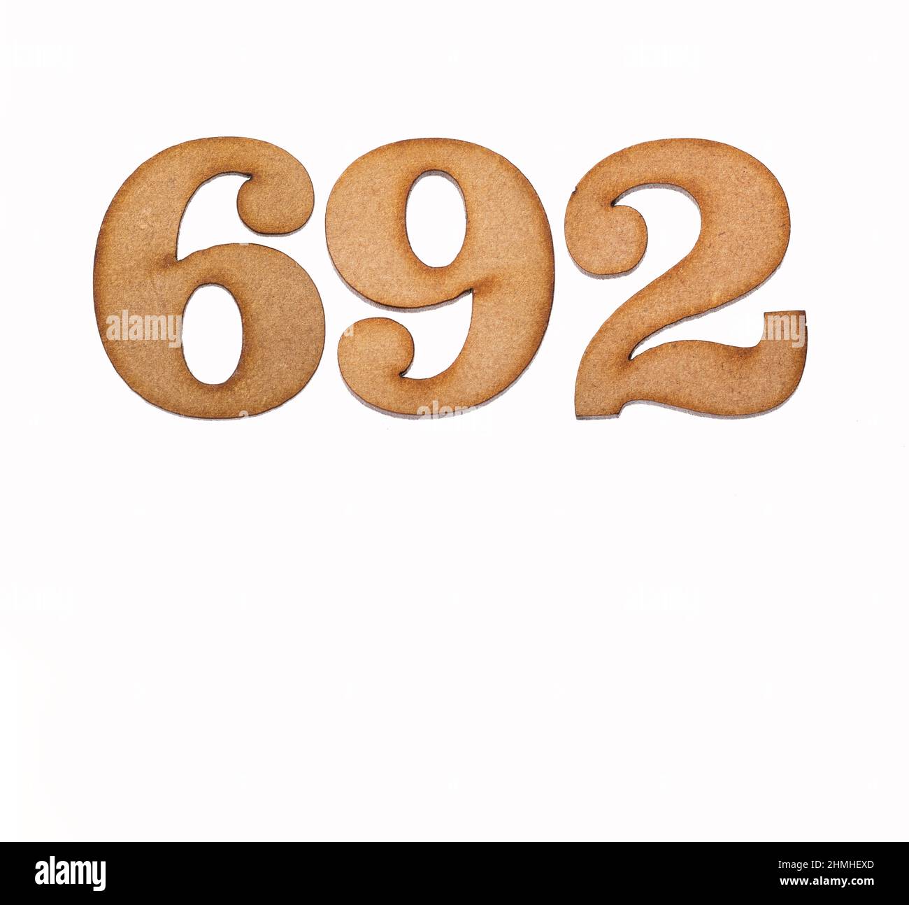 Number 692 - Piece of wood isolated on white background Stock Photo - Alamy