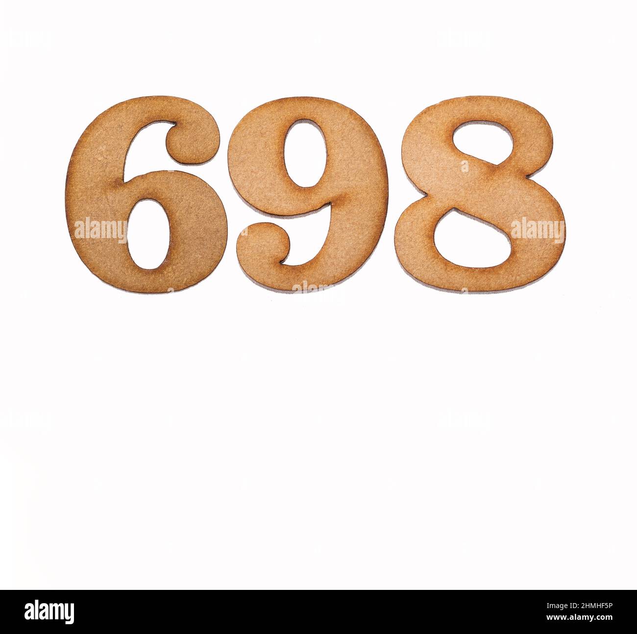 Number 698 - Piece of wood isolated on white background Stock Photo - Alamy