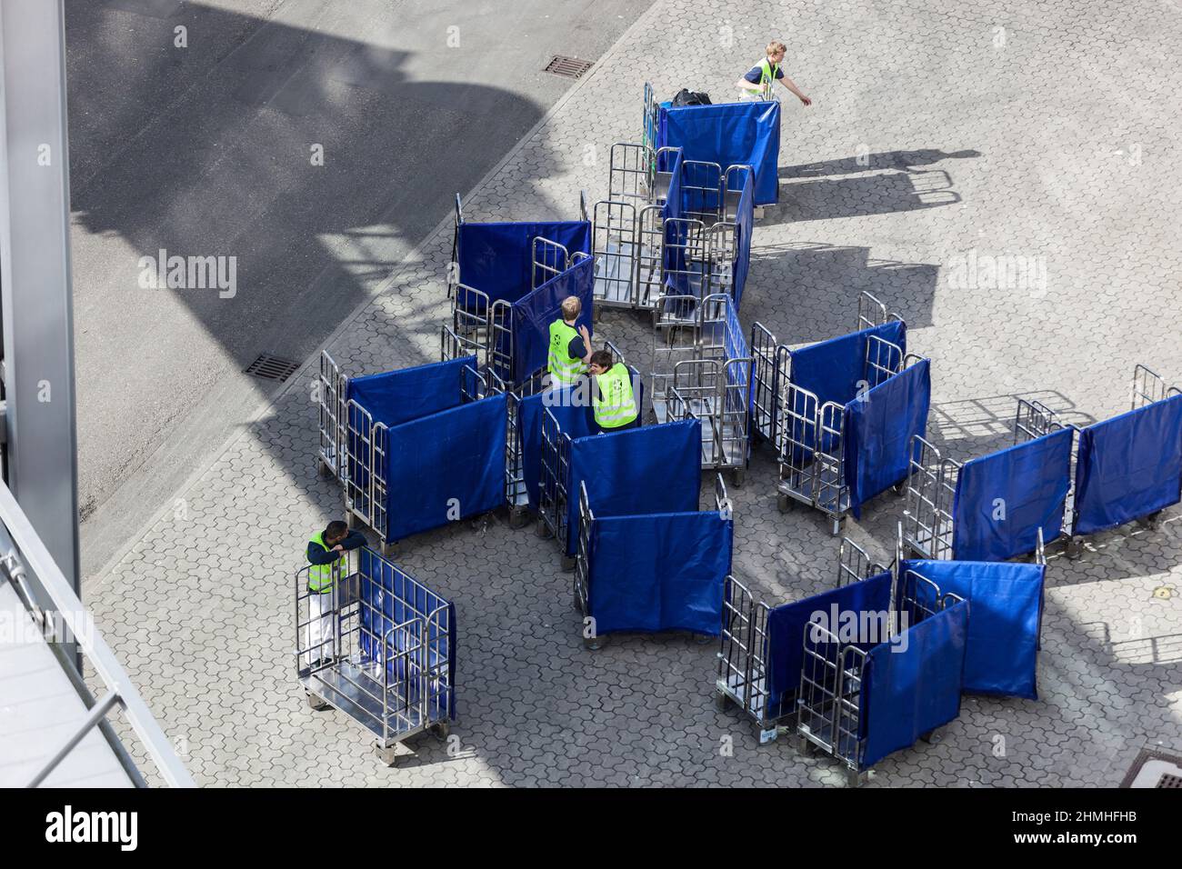 Baggage carts at a terminal Stock Photo - Alamy