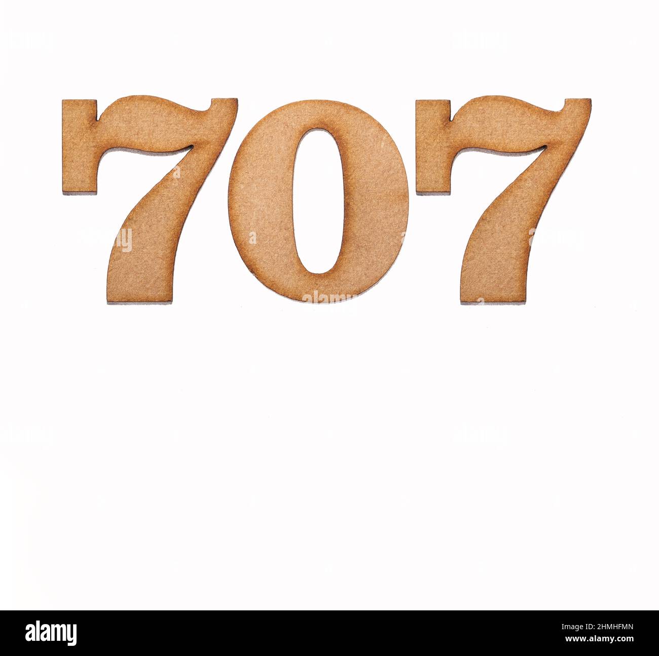 Number 707 in wood, isolated on white background Stock Photo - Alamy