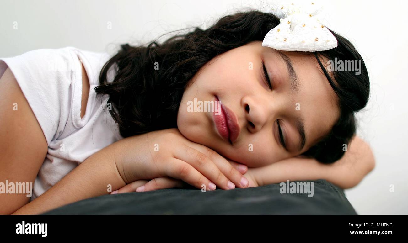 Child napping close-up face. Hispanic mixed race little girls sleeping ...