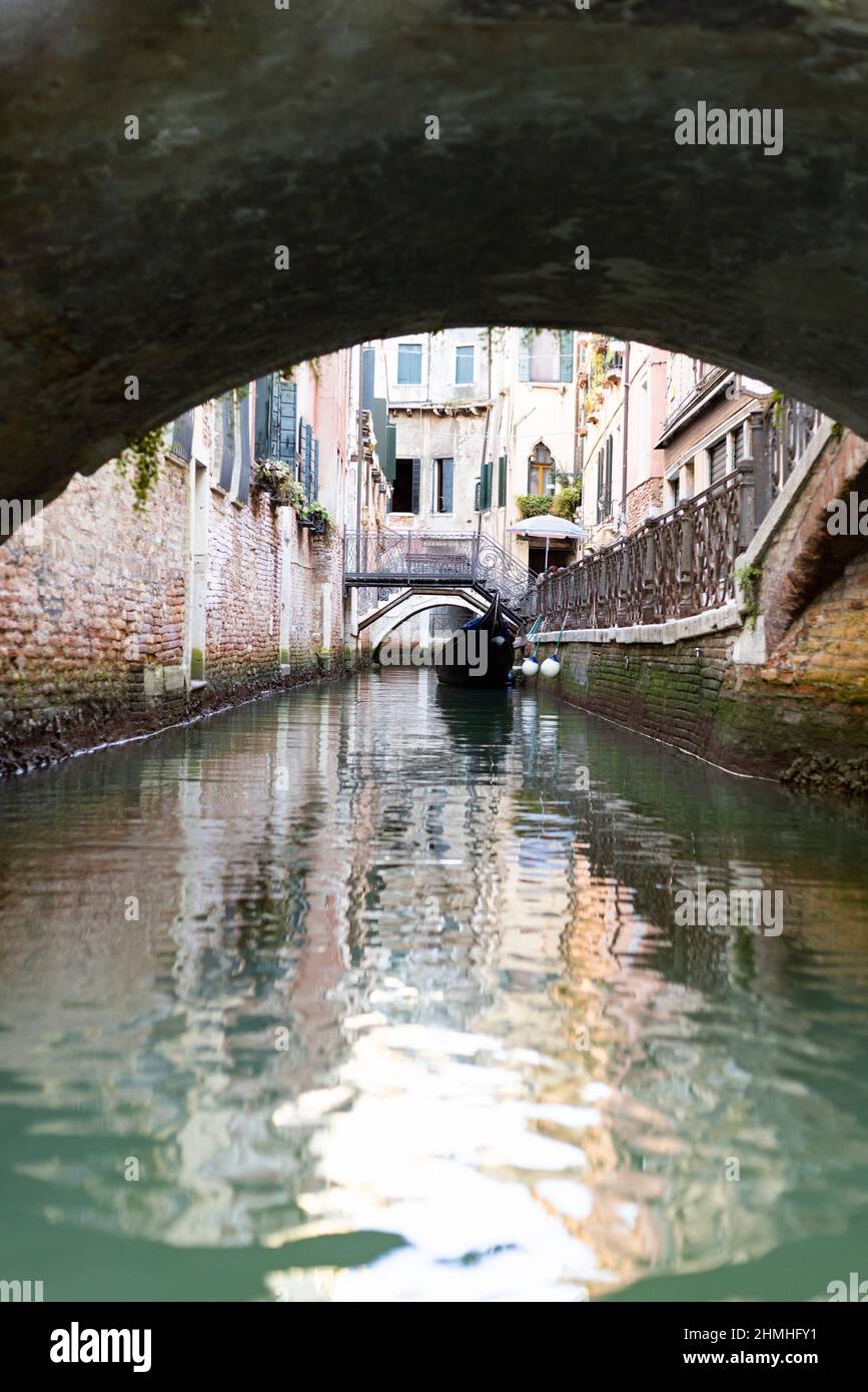 Traveling on a small canal in venice hi-res stock photography and ...