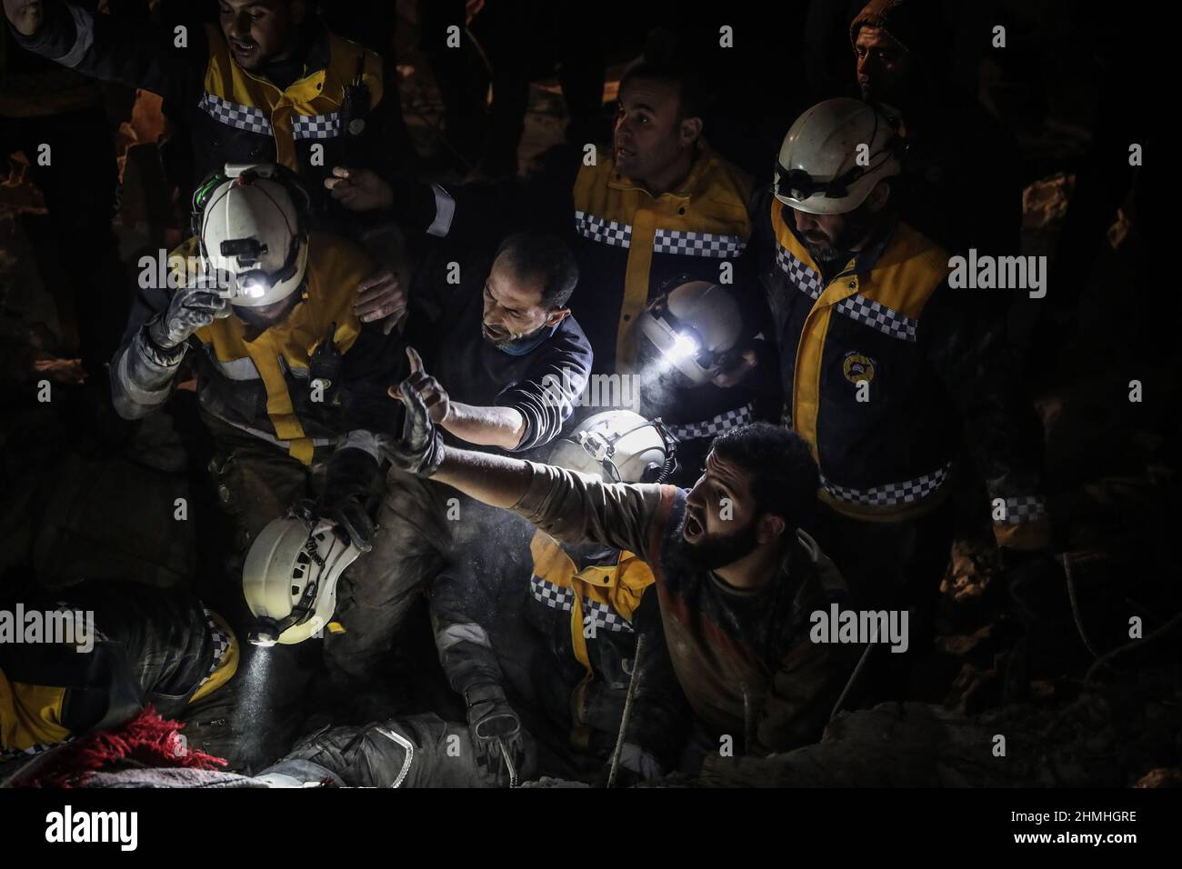 Idlib City, Syria. 09th Feb, 2022. Members of the Syria Civil Defence ...