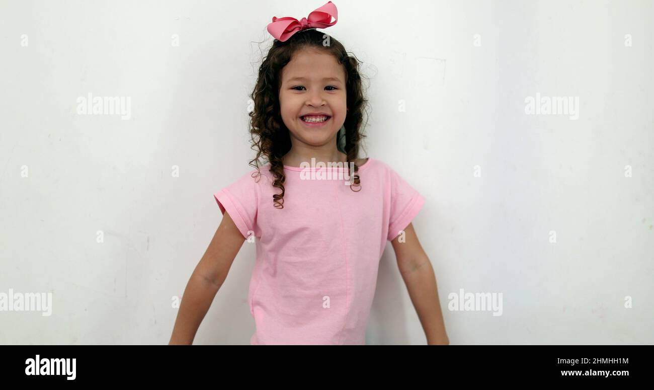 Happy little girl dancing, child kid dance moving body Stock Photo - Alamy