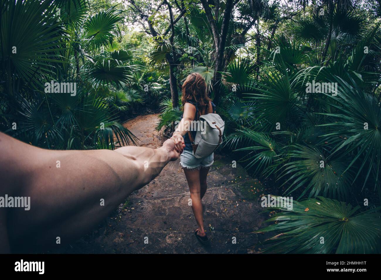 Beautiful couple traveling together. The Jungle in Mexico Stock Photo ...