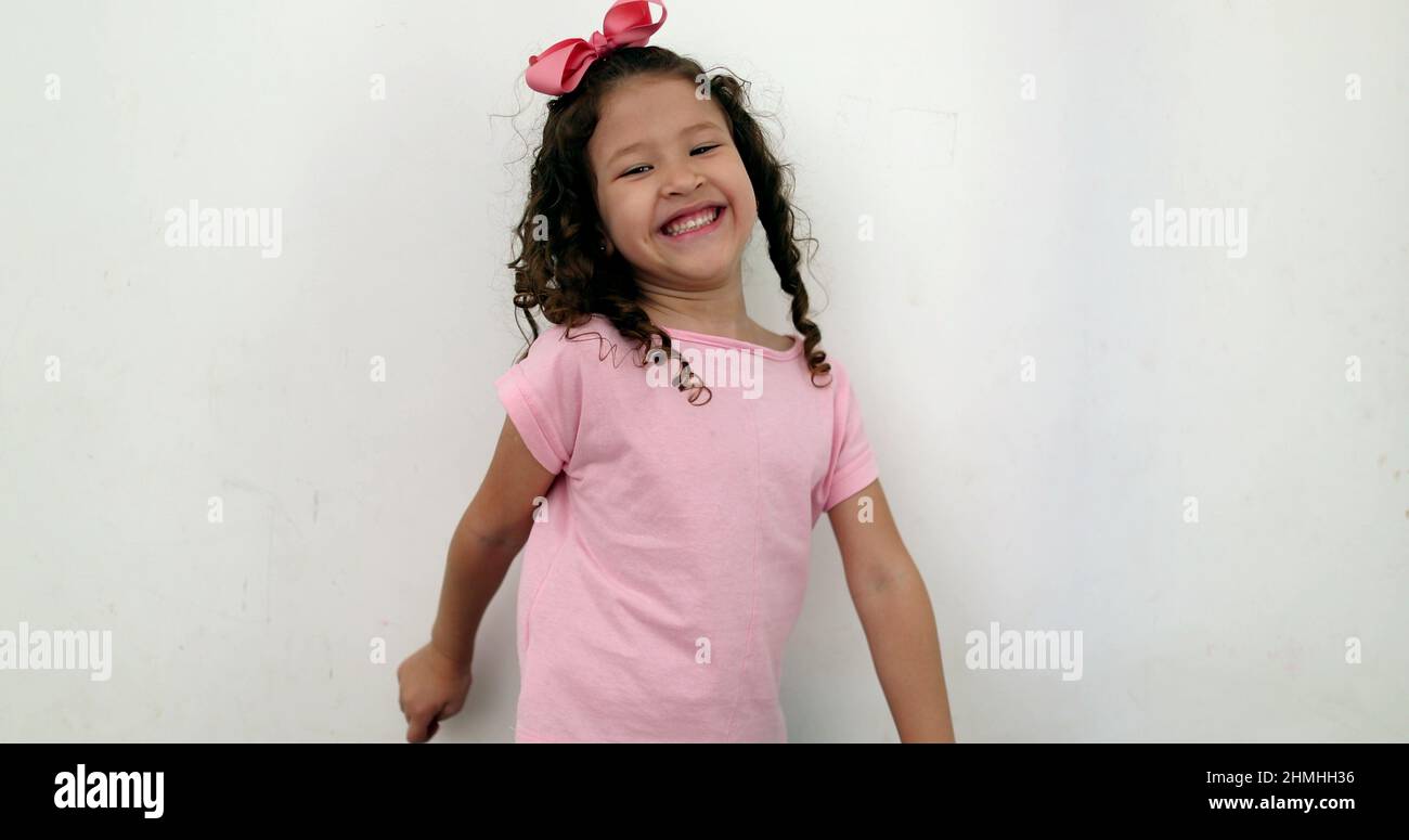 Happy little girl dancing, child kid dance moving body Stock Photo - Alamy