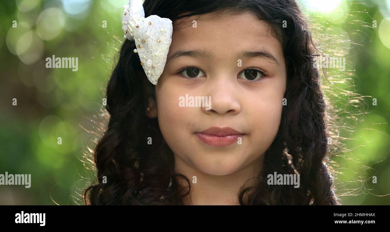 Little girl child removes face mask feeling relief, taking a deep ...