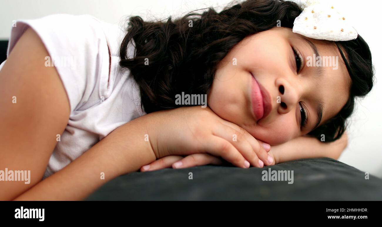 Little girl child trying to nap and rest Stock Photo - Alamy