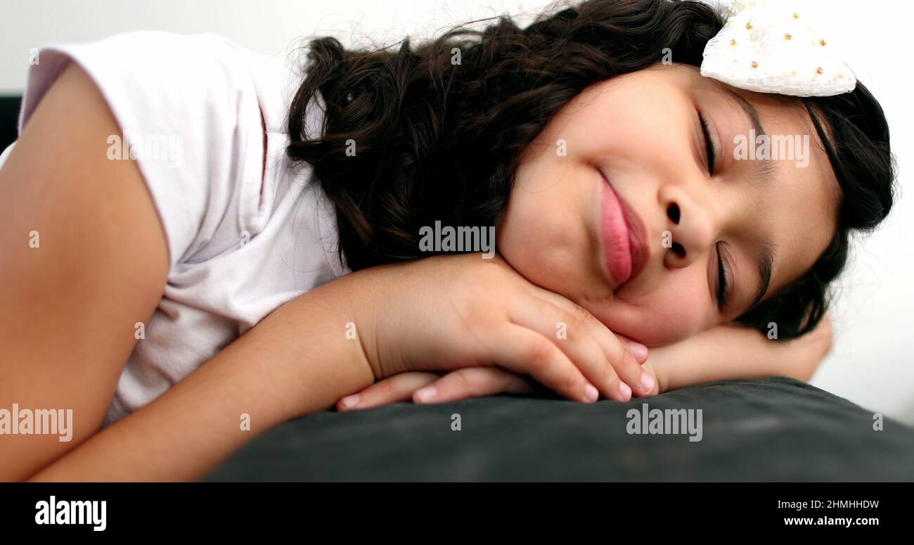 Little girl child trying to nap and rest Stock Photo - Alamy