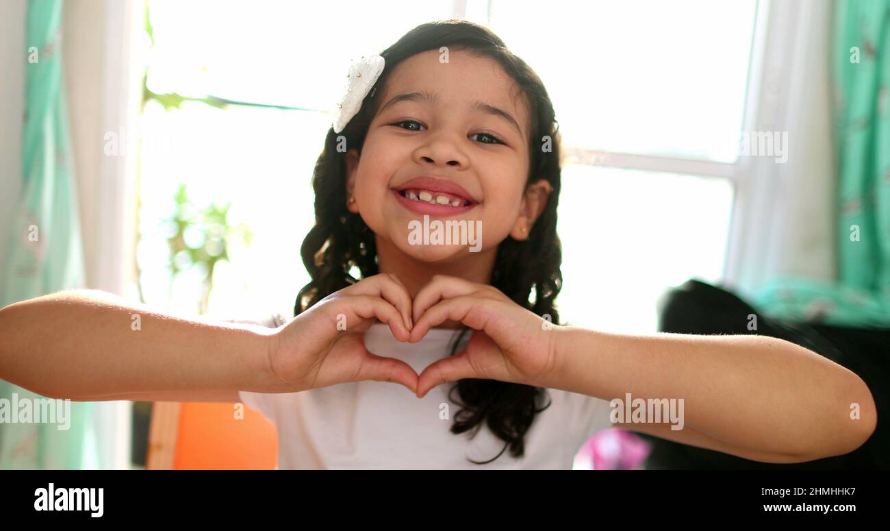 Girl doing hands heart hi-res stock photography and images - Alamy