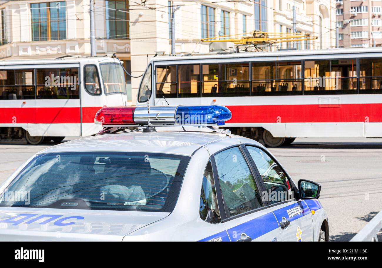 Samara, Russia - May 9, 2019: Colorful lights on the top of a police ...