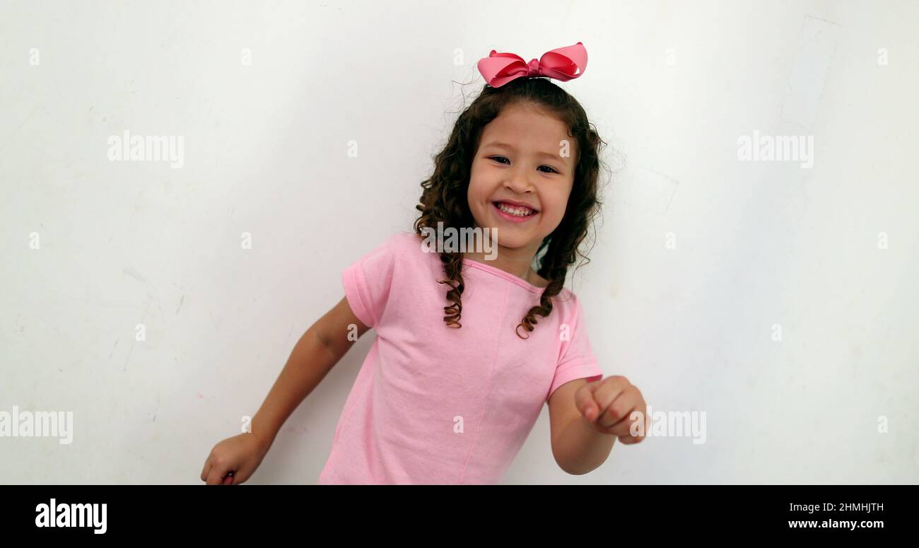 Small little girl child dancing Stock Photo - Alamy